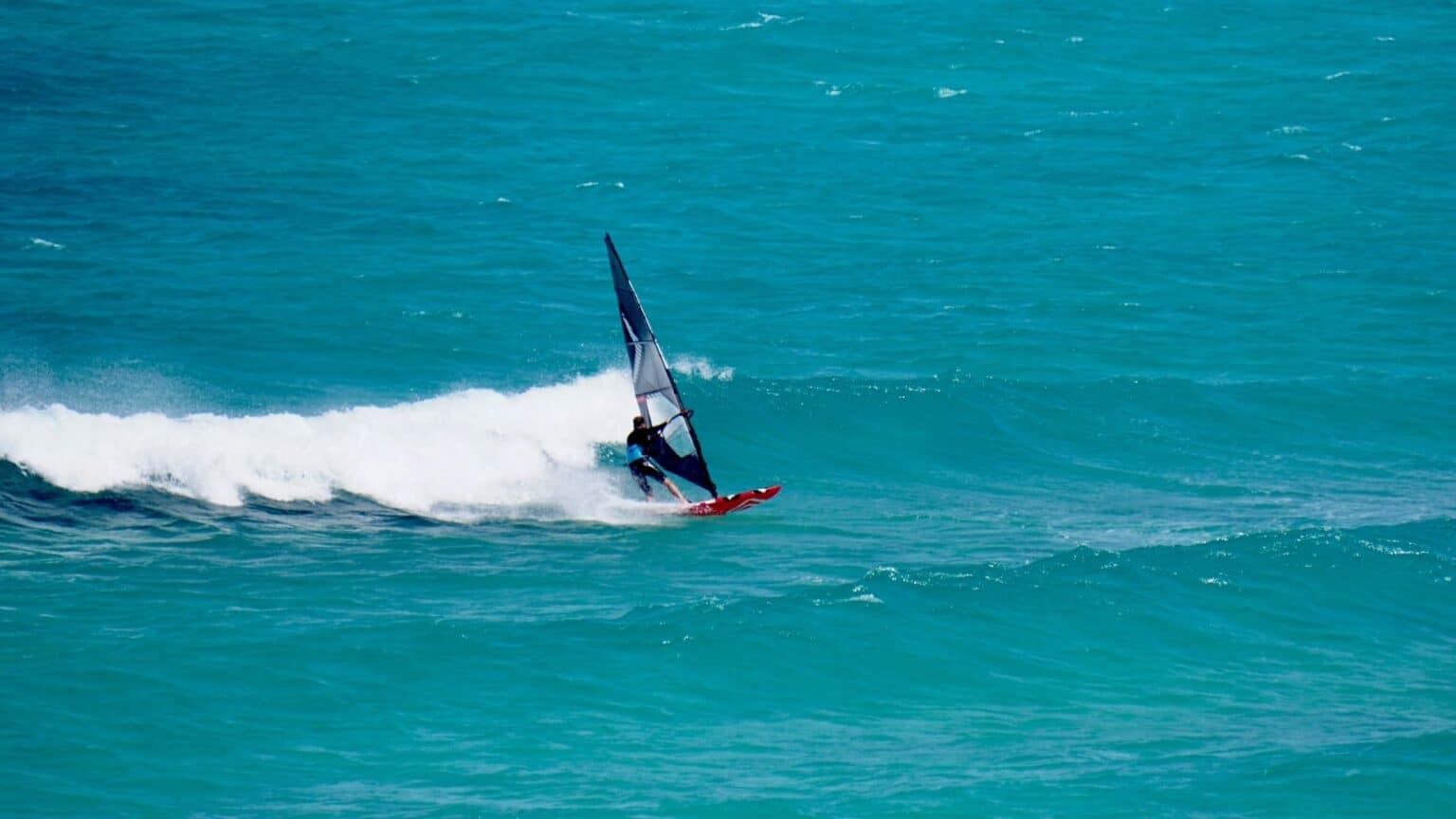 What Is Windsurfing: How Does It Differ From Normal Surfing? - Rapture ...